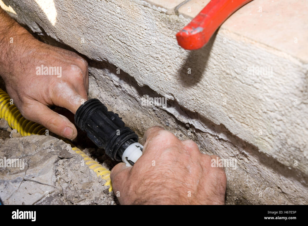 bricklayer at work in a site Stock Photo - Alamy