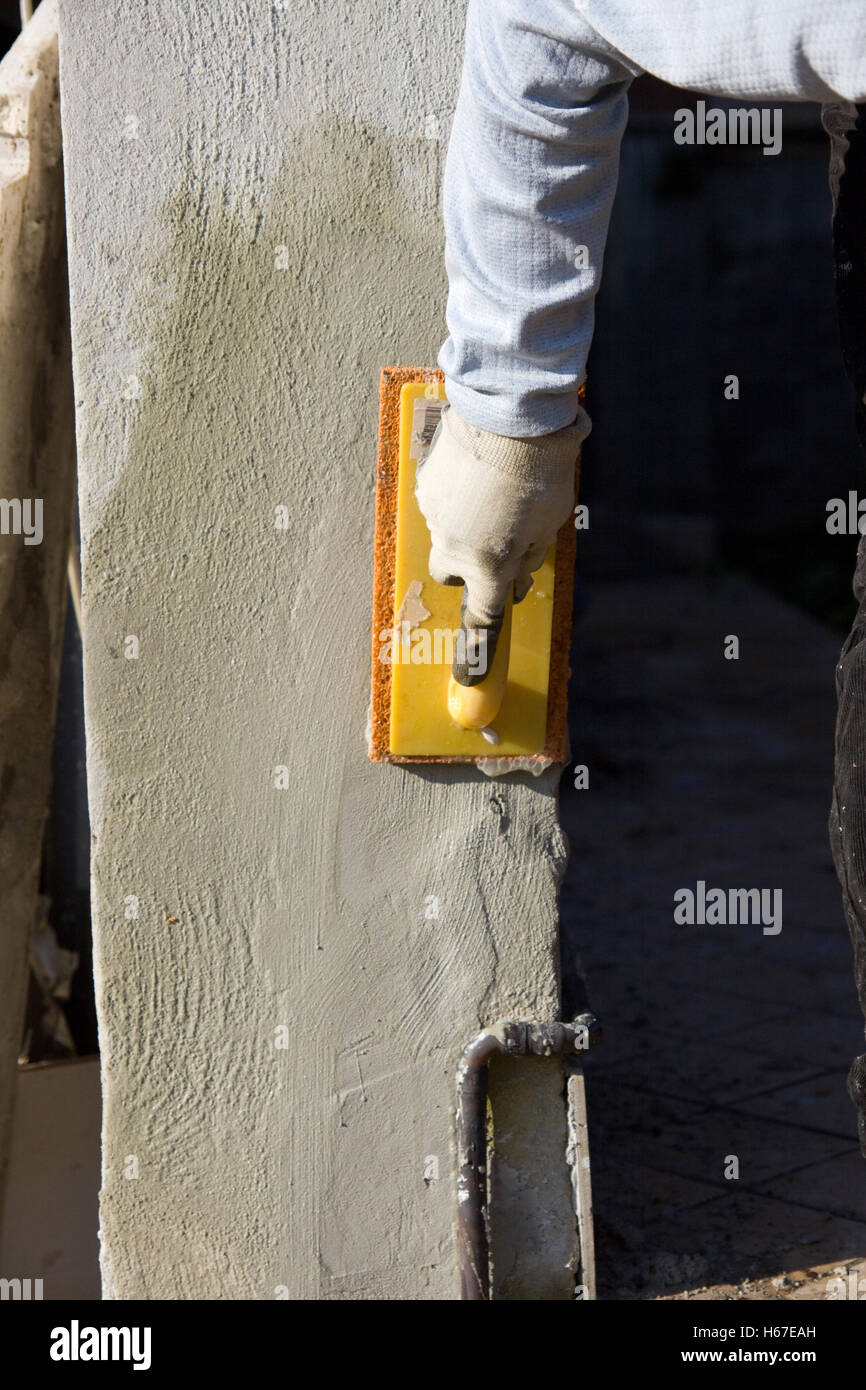 bricklayer at work in a site Stock Photo - Alamy