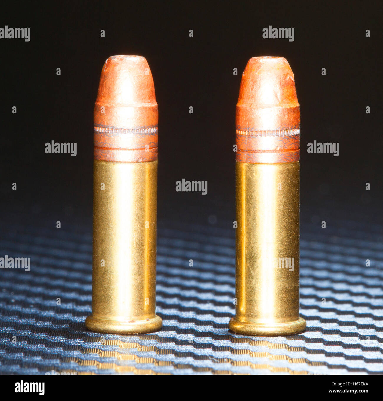 Two rimfire cartridges made for chambering in twenty two caliber ...