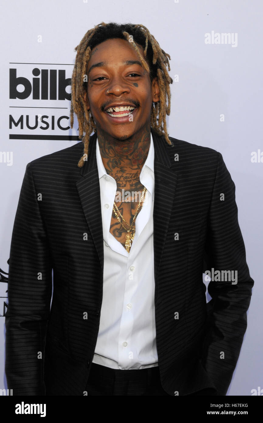 Rapper Wiz Khalifa arrives at the 2015 Billboard Music Awards at the ...