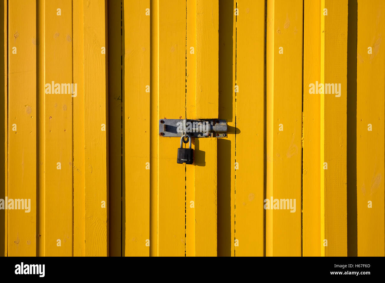 Beach hut locks Stock Photo - Alamy