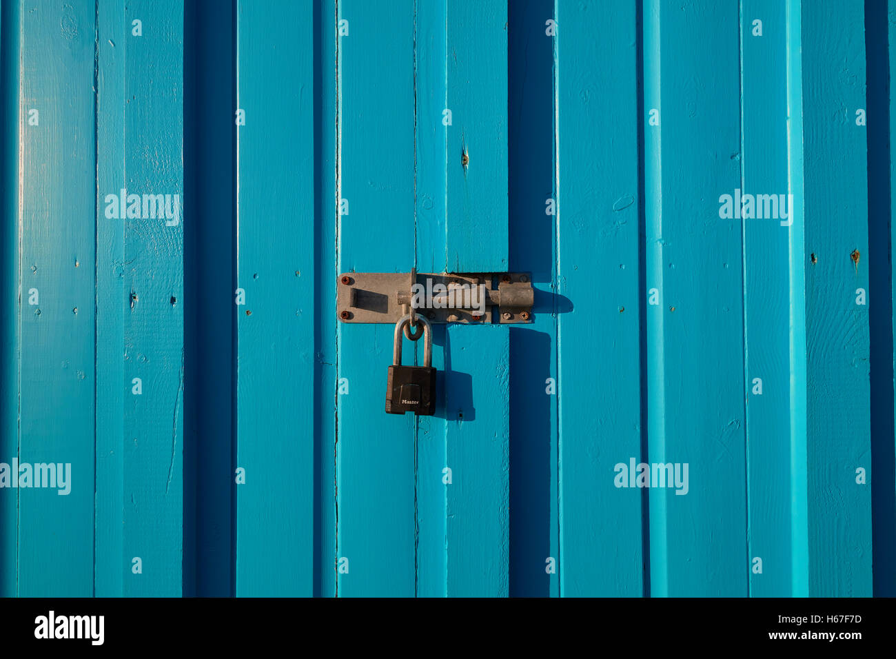 Beach hut locks Stock Photo - Alamy