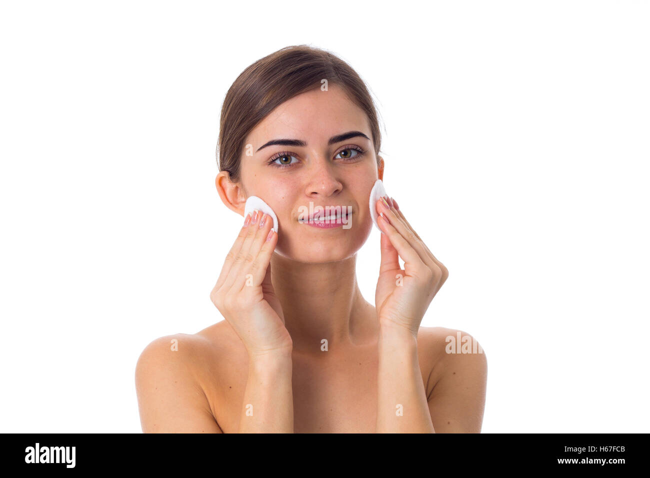 Young woman using cotton pads Stock Photo - Alamy