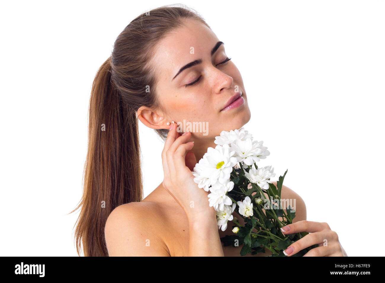 Young woman holding white flowers Stock Photo - Alamy Young woman holding white flowers Stock Photo - Alamy