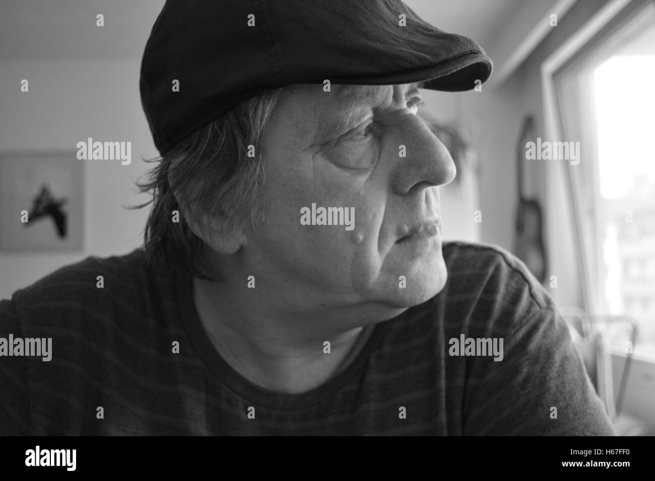 Portrait of a man with a cap Stock Photo - Alamy