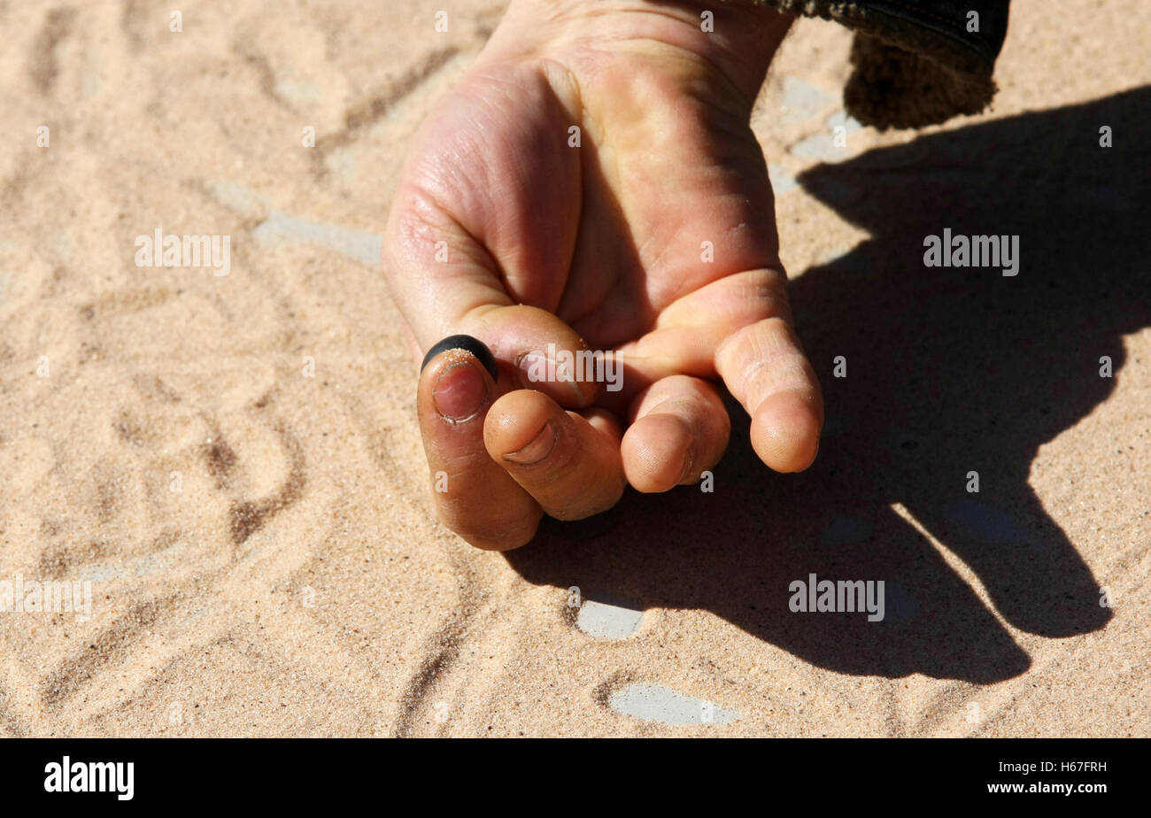 Hand holding marbles hi-res stock photography and images - Alamy