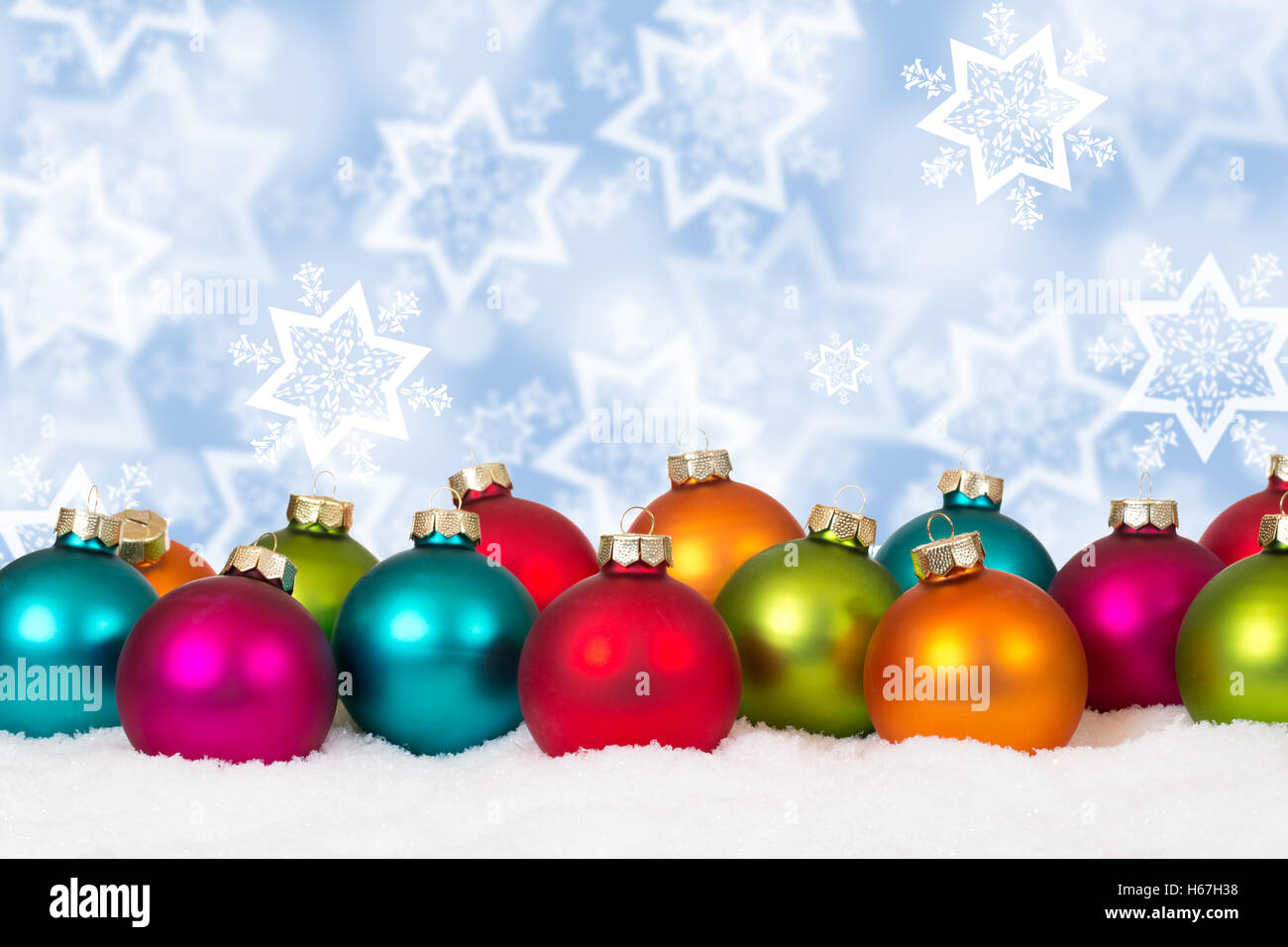 Many colorful Christmas balls background decoration snow winter snowing ...