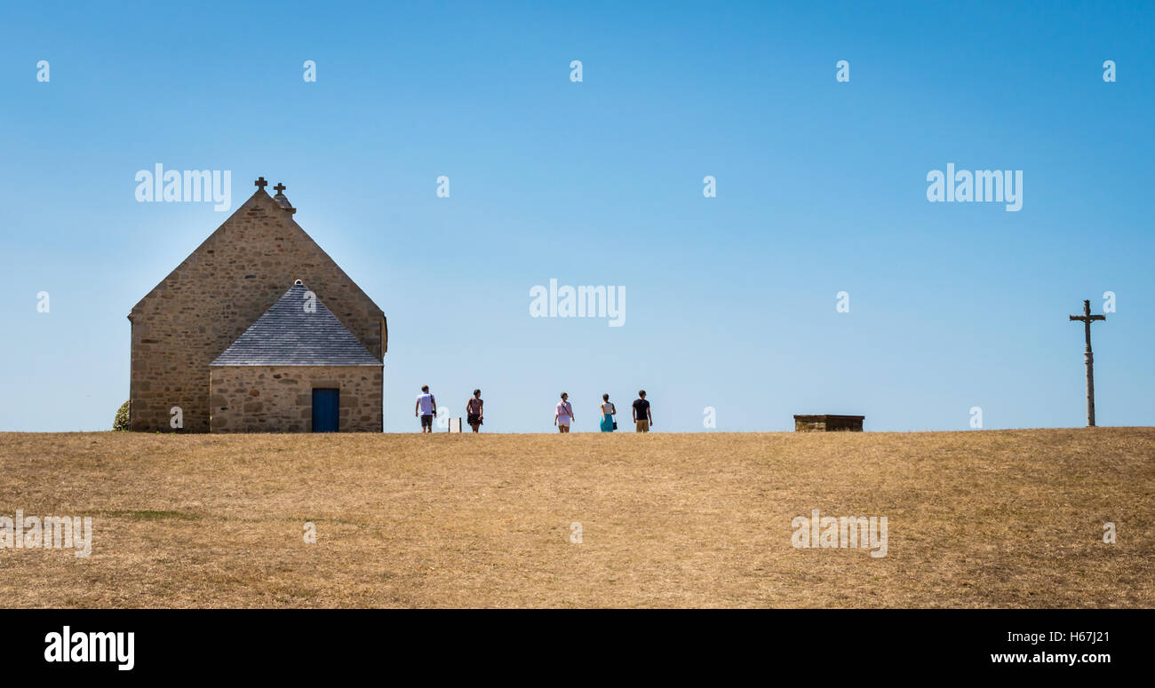 Ancient stone church and cross Stock Photo - Alamy
