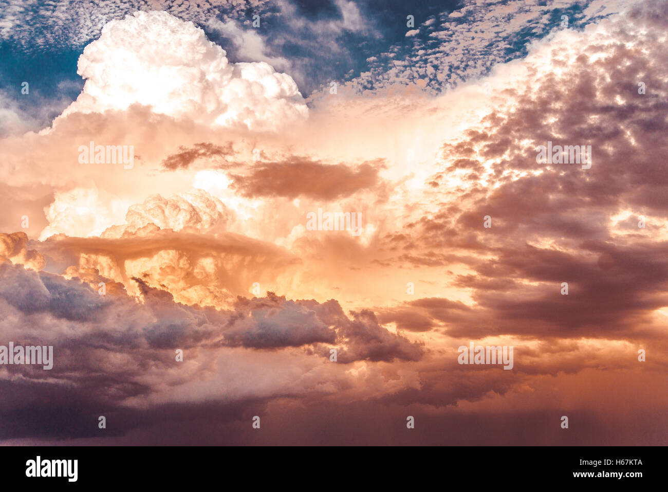 Storm Clouds Lit by Sunset Stock Photo - Alamy