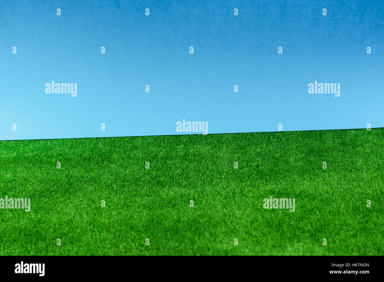 Fake green grass for use as nature background Stock Photo - Alamy