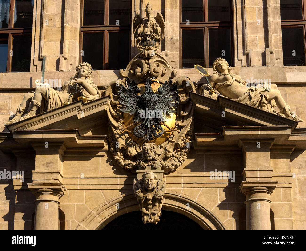 Ornate pediment over doorway of the town hall, Nuremberg Stock Photo ...