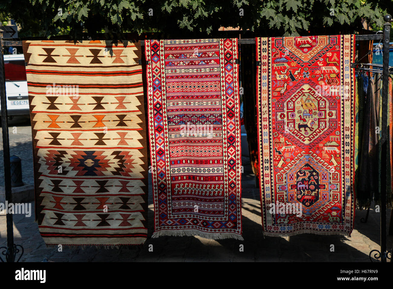 Old hand made carpet and rugs of traditional types Stock Photo - Alamy
