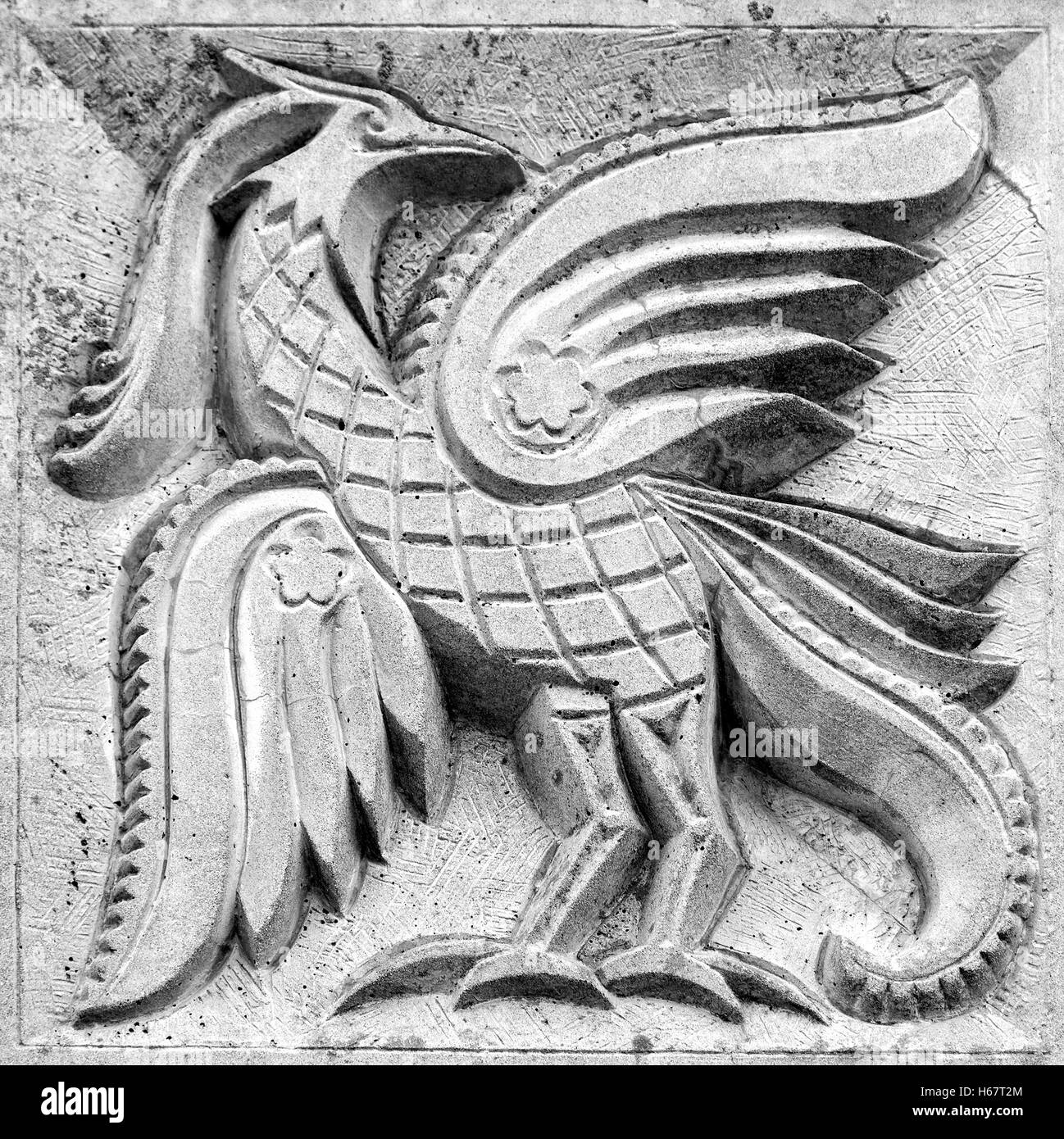 big fairy bird, stone bas-relief on the wall Stock Photo - Alamy