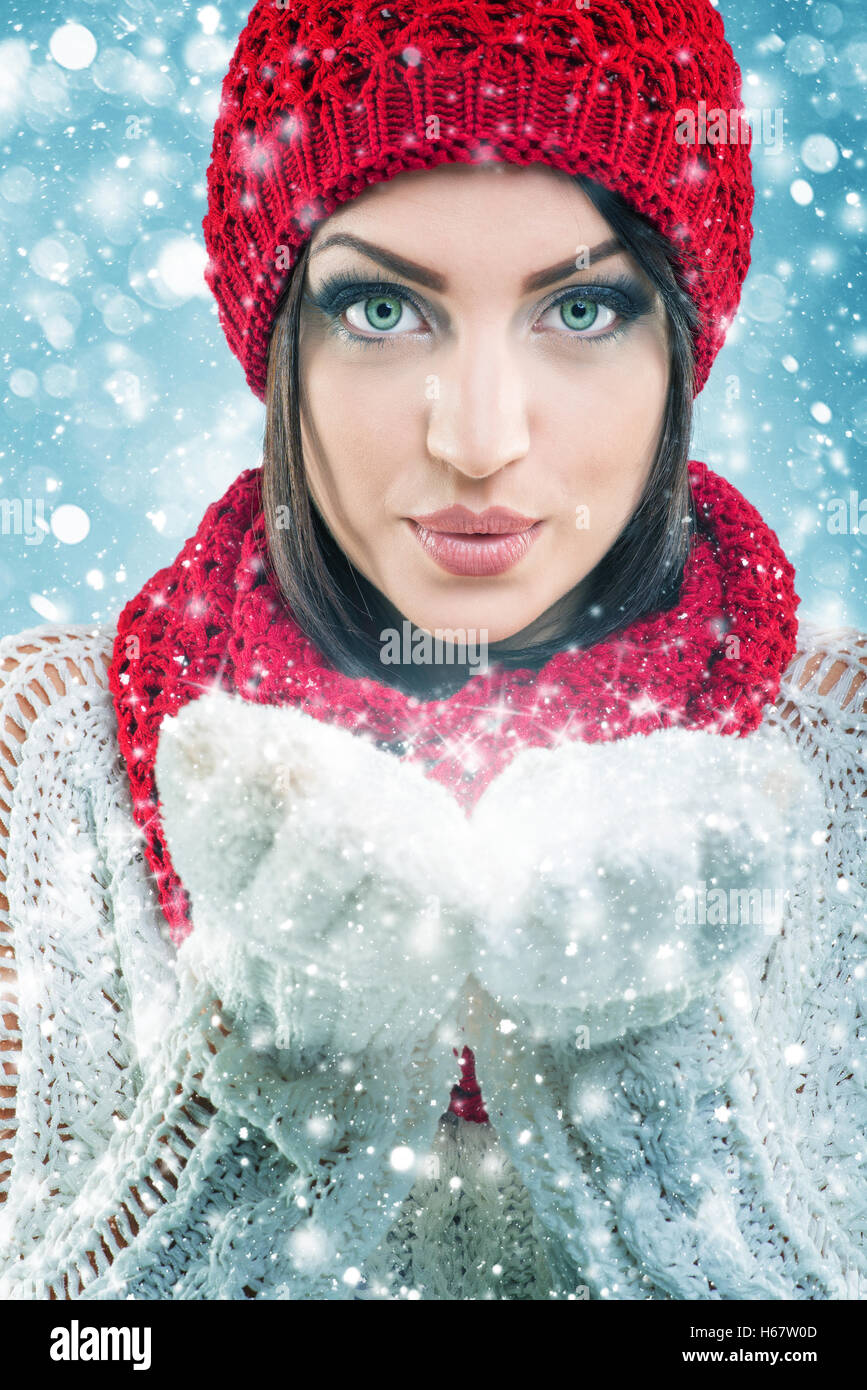 Santa Women holding snowflake Stock Photo - Alamy