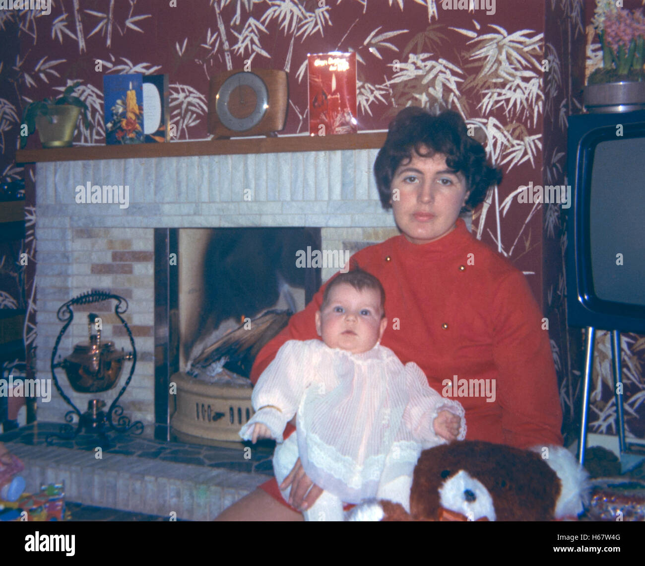 a mother and daughter on christmas day england 1970s Stock Photo - Alamy