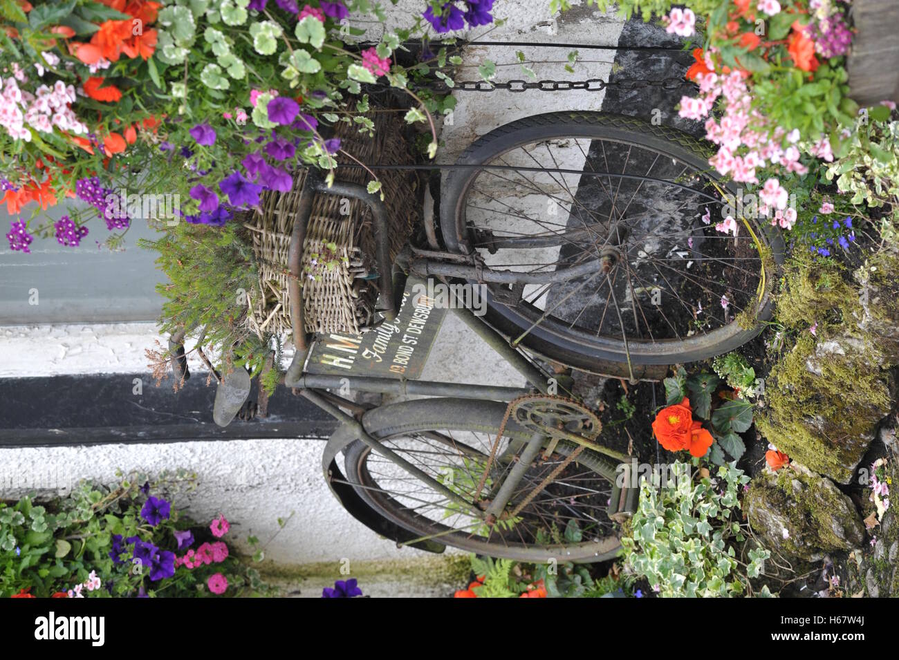 Cycle propped against wall hi-res stock photography and images - Alamy