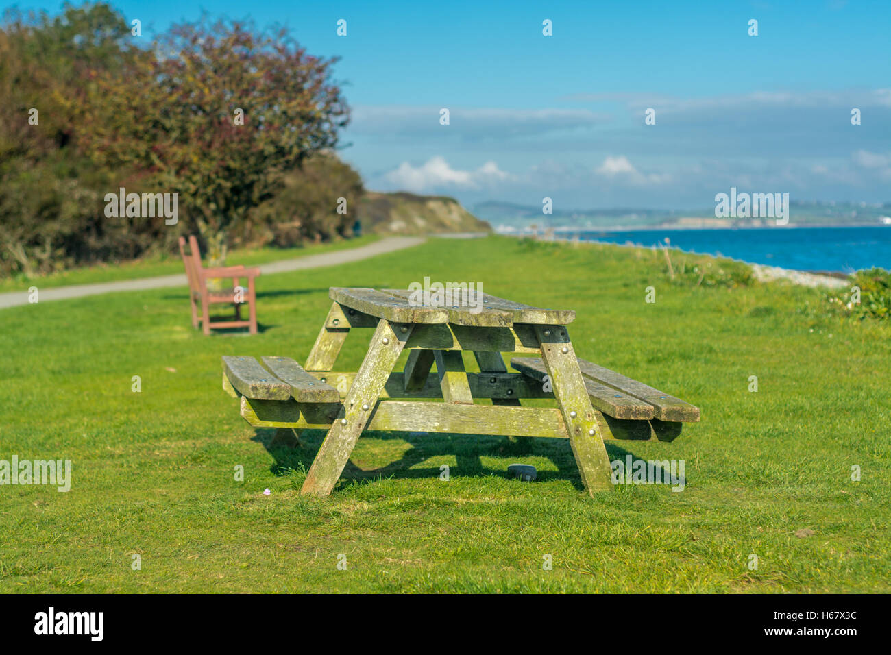 Coastal path and benches at Penrhos country Park on Anglesey Stock ...