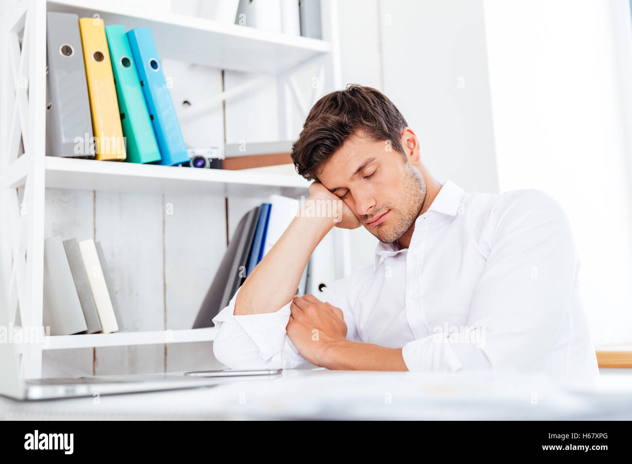 Sleeping salesman hi-res stock photography and images - Alamy