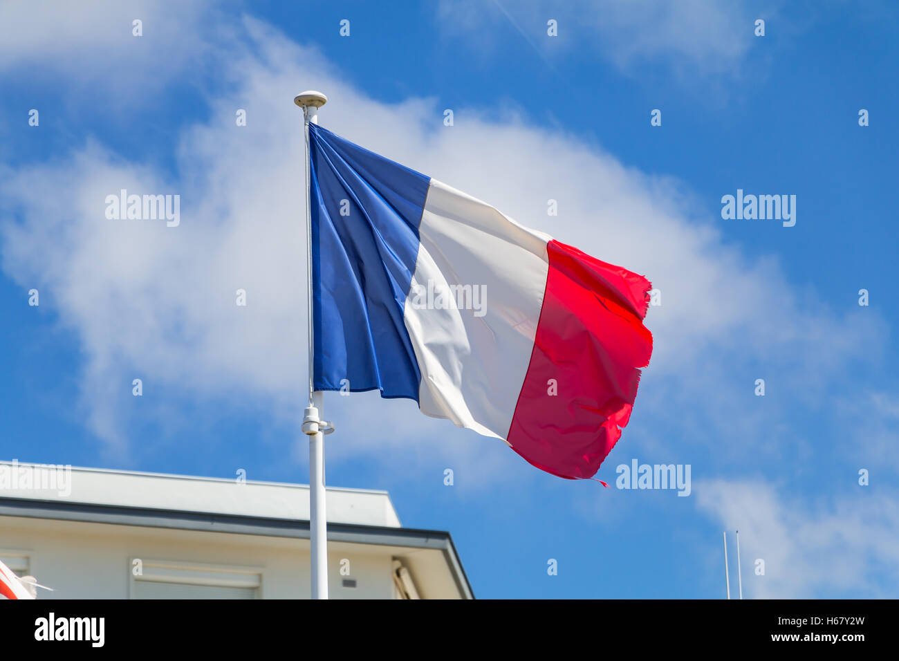 French flag on the blue sky Stock Photo - Alamy