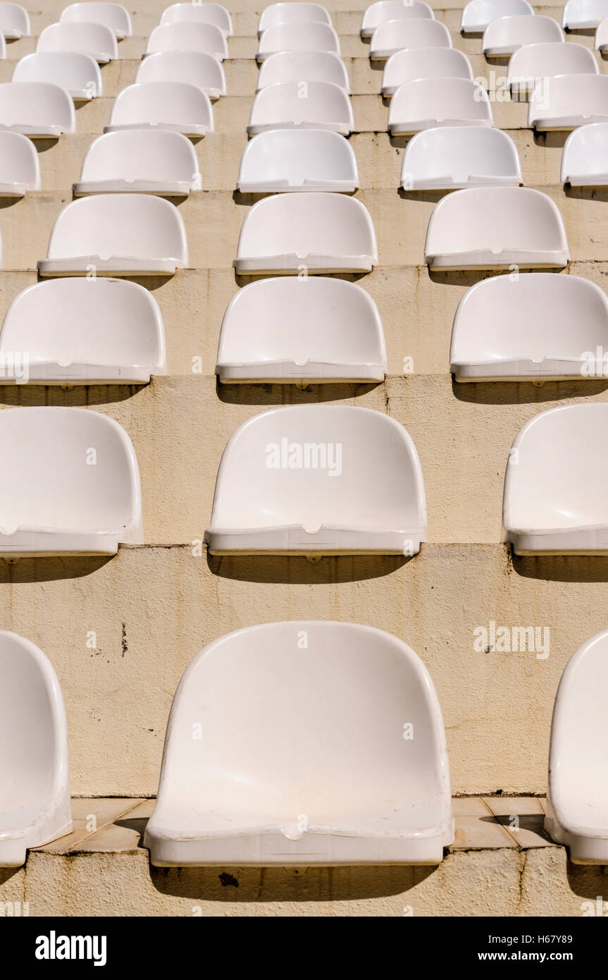 Plastic seats in an amphitheatre style outdoor theatre Stock Photo - Alamy