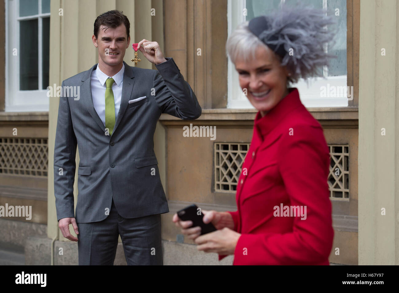 Judy Murray smiles as she photographs her son Jamie Murray after he ...