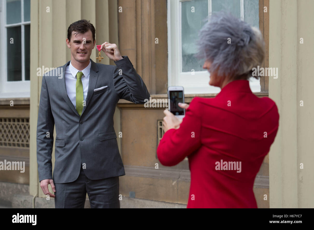 Judy Murray photographs her son Jamie Murray after he received his ...