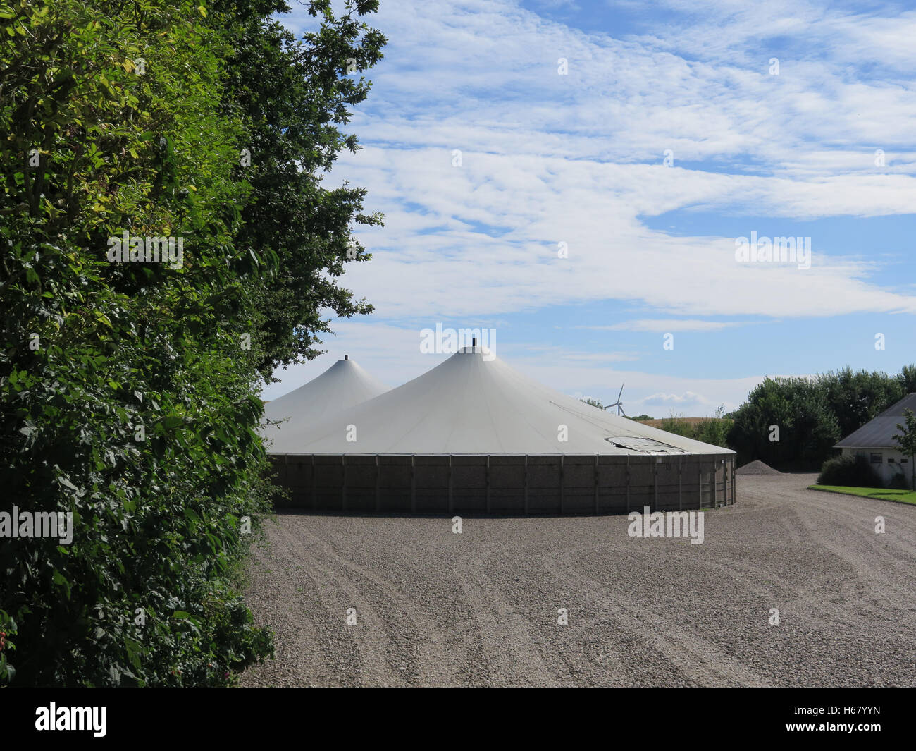 Two circular covered Slurry Tanks at farm in Southern Denmark Stock ...