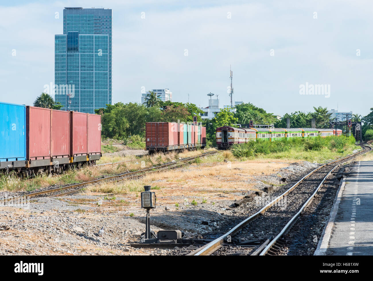 Old ordinary train is leaving from the container freight station in the ...