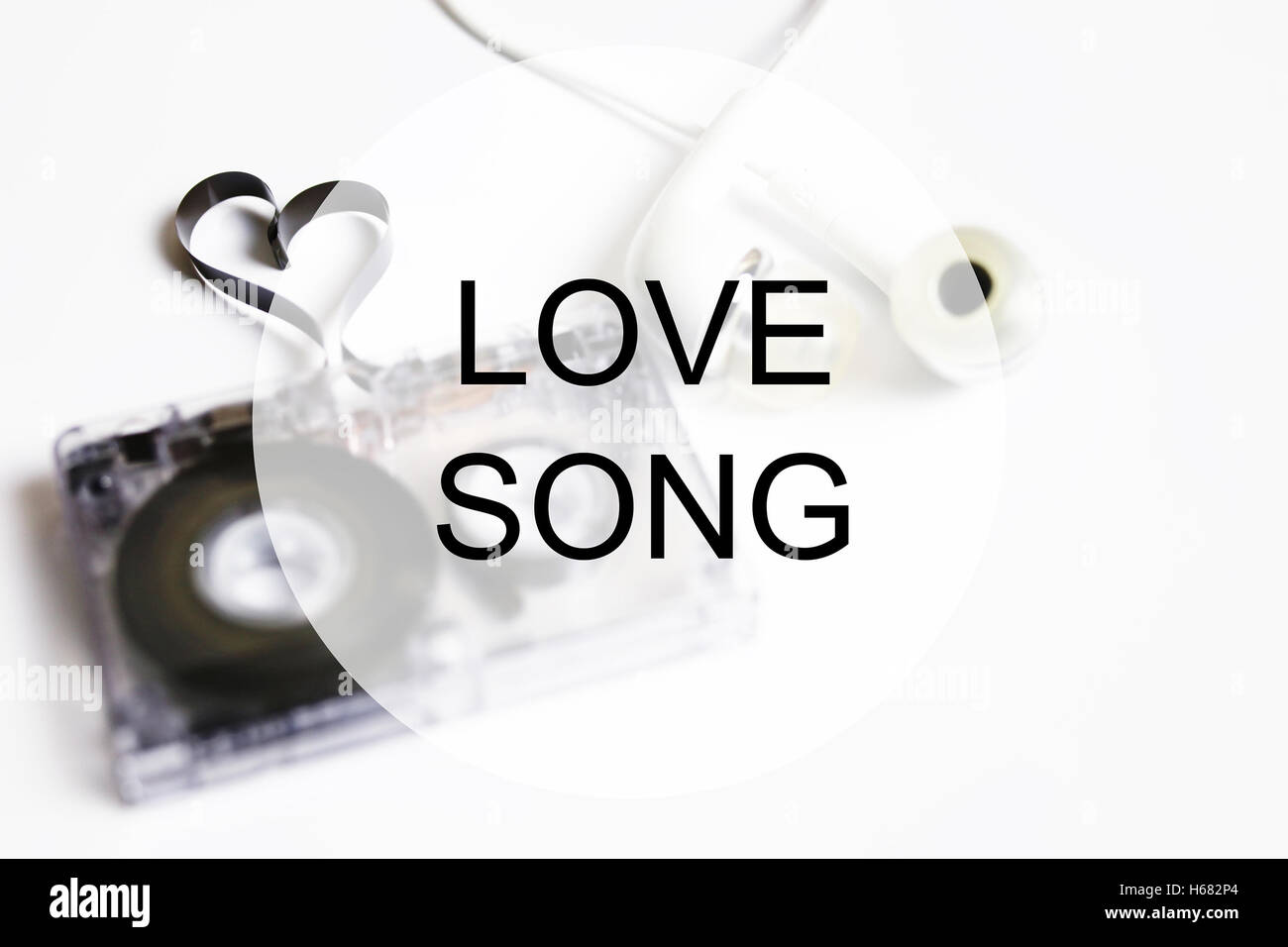 love song background om audio cassette tape shape heart Stock Photo - Alamy