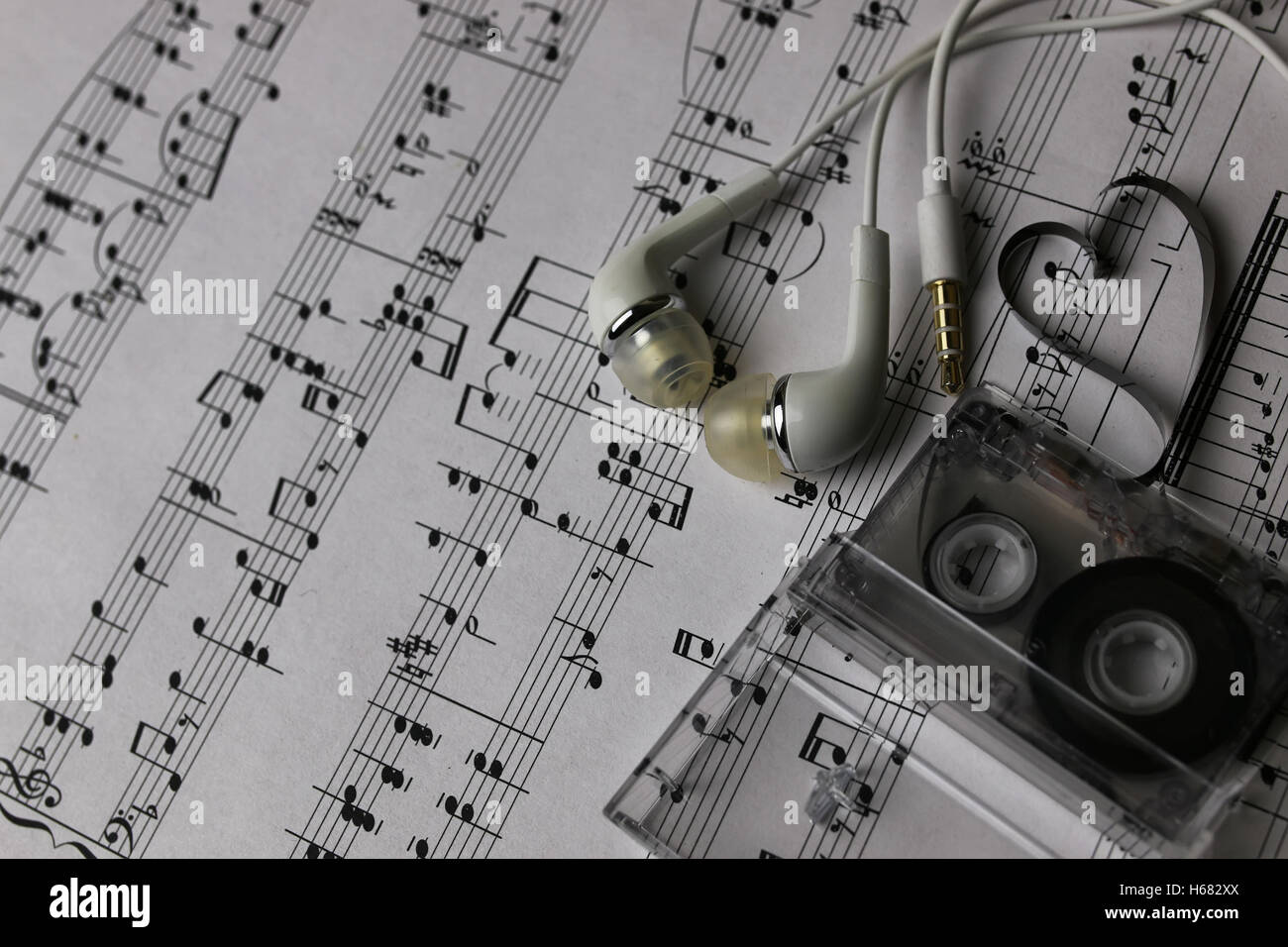 notes background and headphones Stock Photo - Alamy