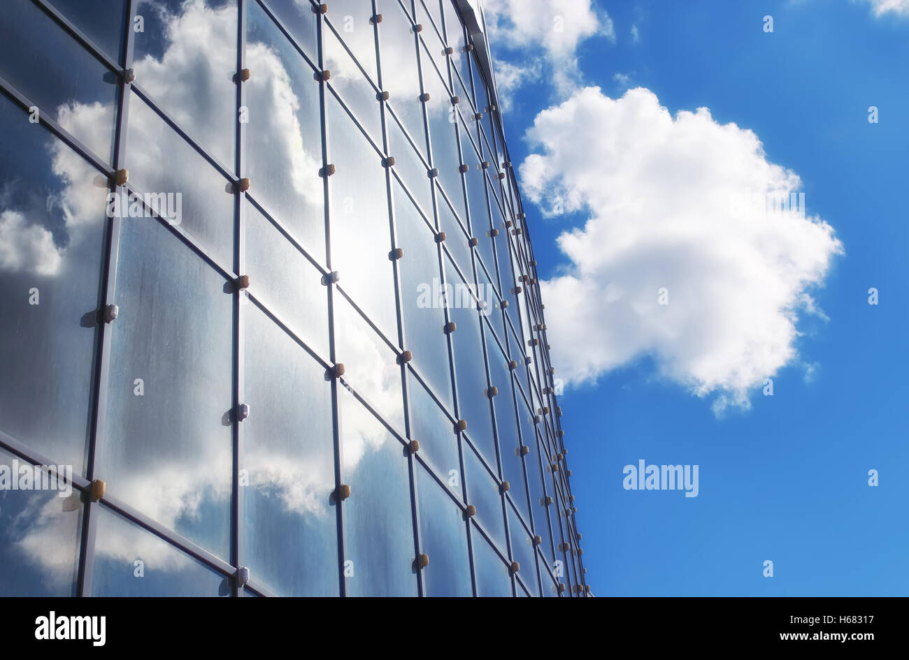 the sun and the sky in a glass building Stock Photo - Alamy