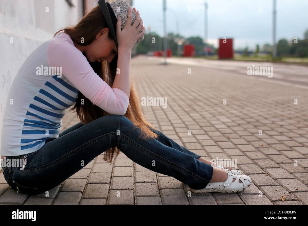girl outdoor road sad alone Stock Photo - Alamy