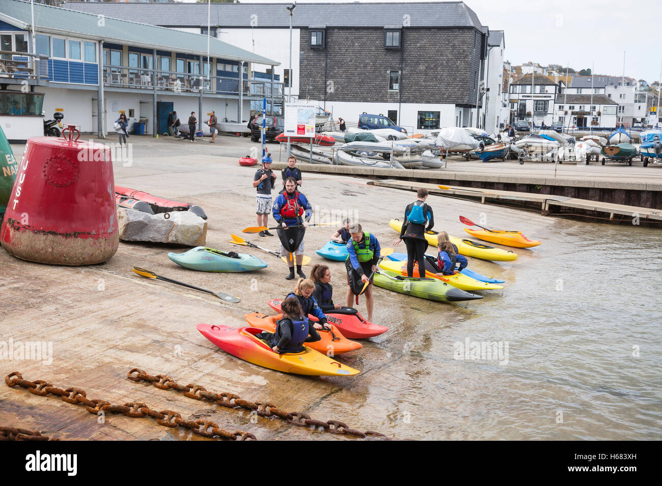 sea kayak lesson with children Stock Photo - Alamy