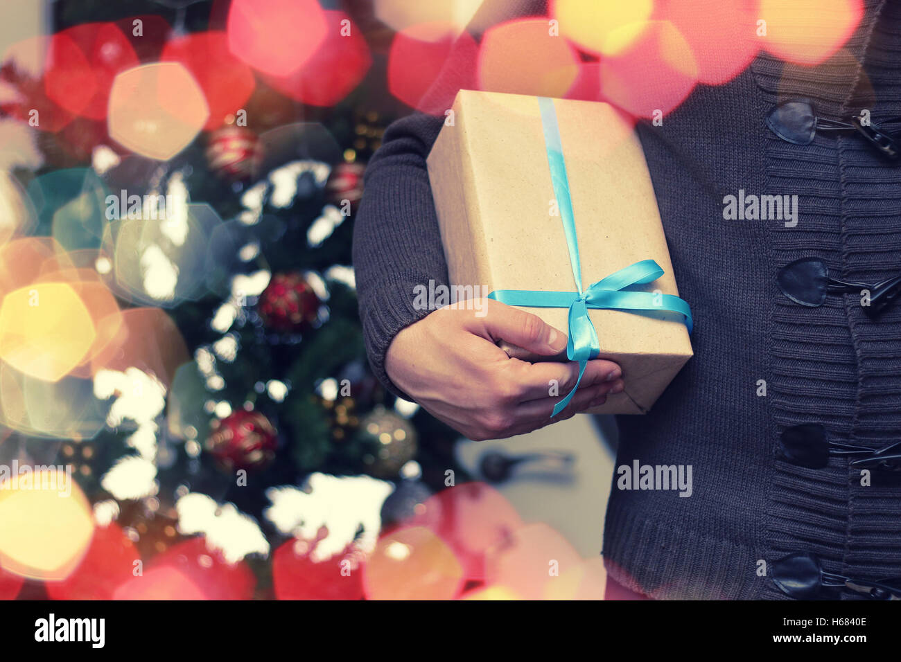 gift stack hand christmas Stock Photo - Alamy
