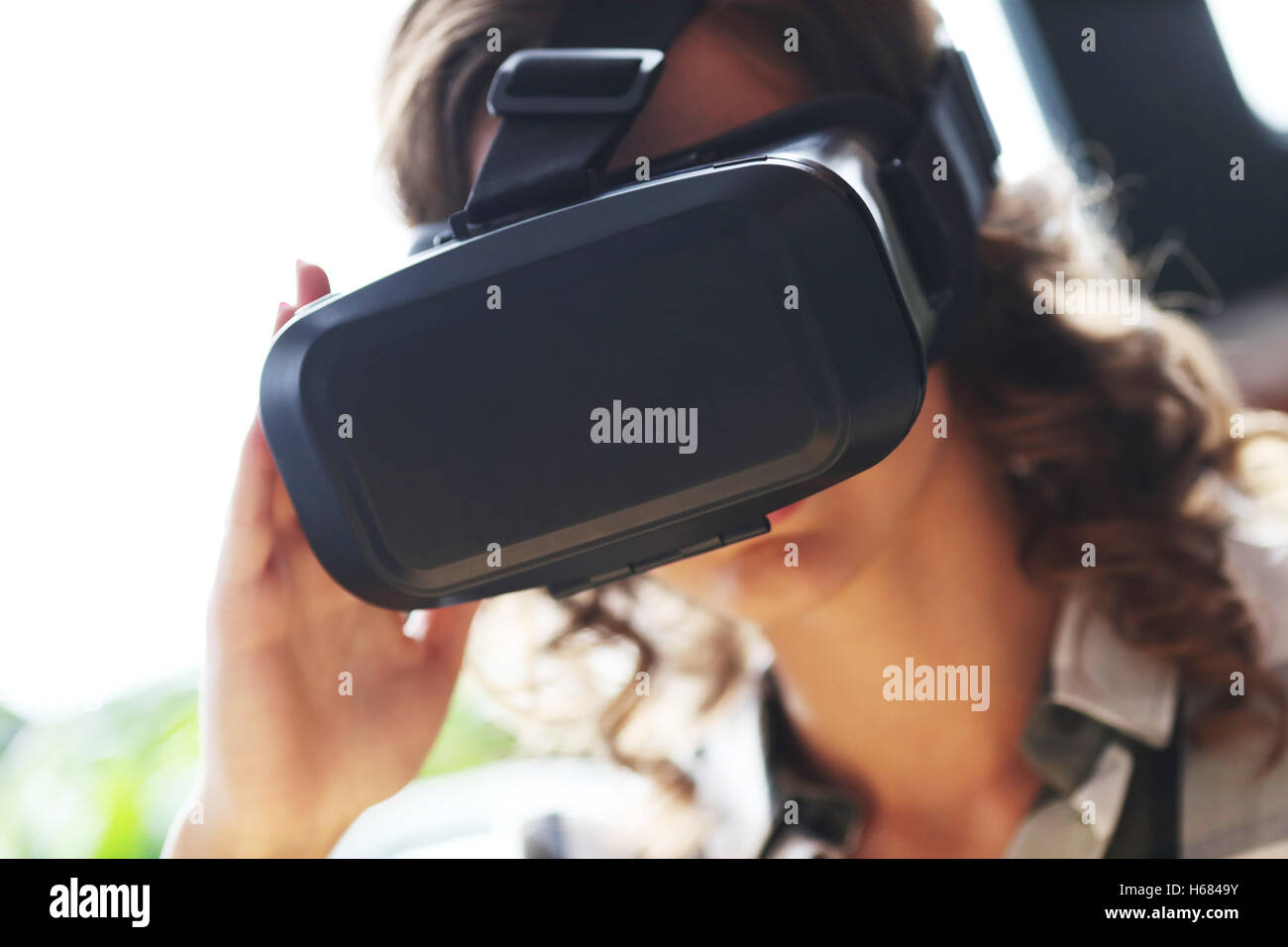 Woman with VR headset Stock Photo - Alamy