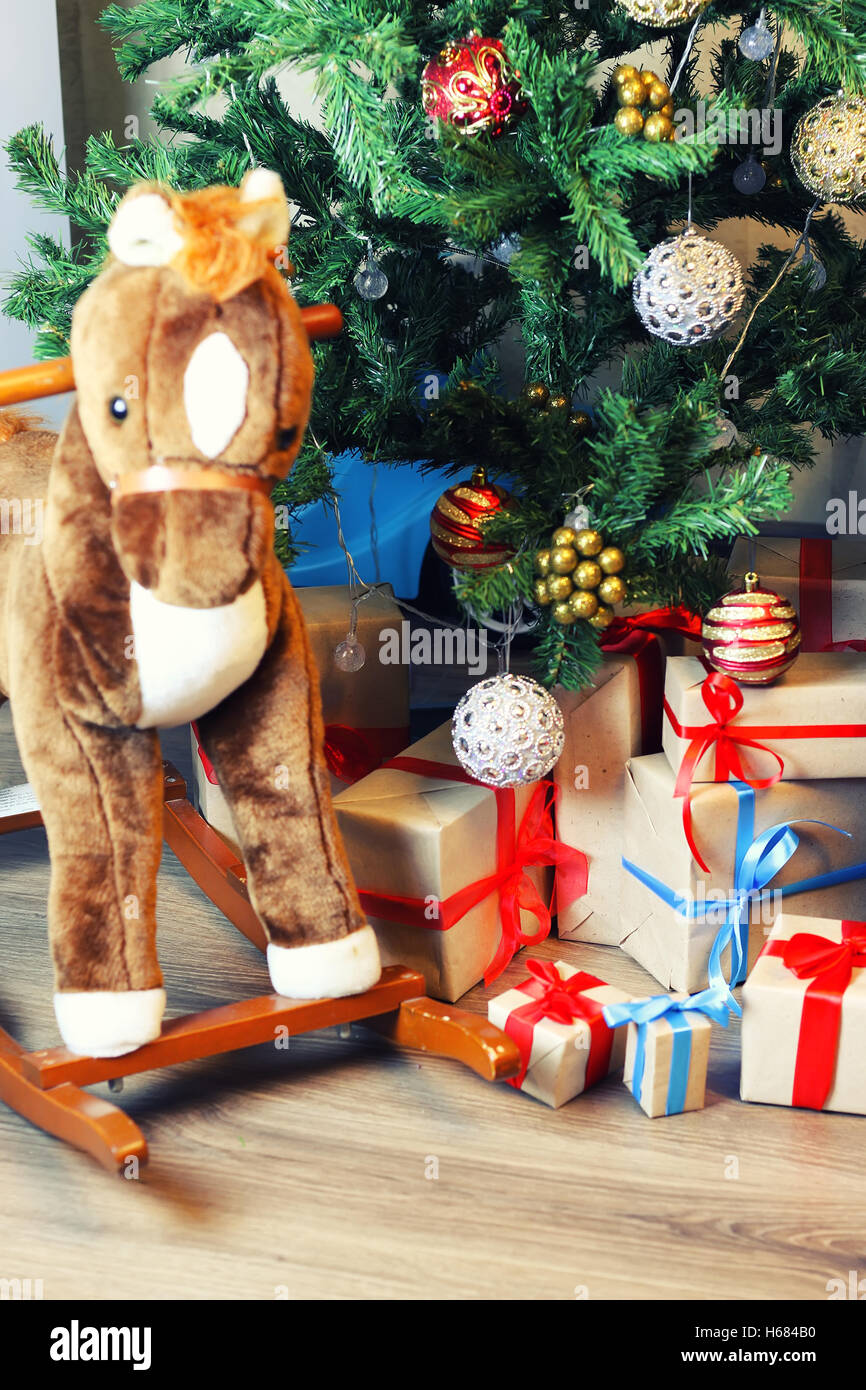 gift stack under tree Stock Photo - Alamy