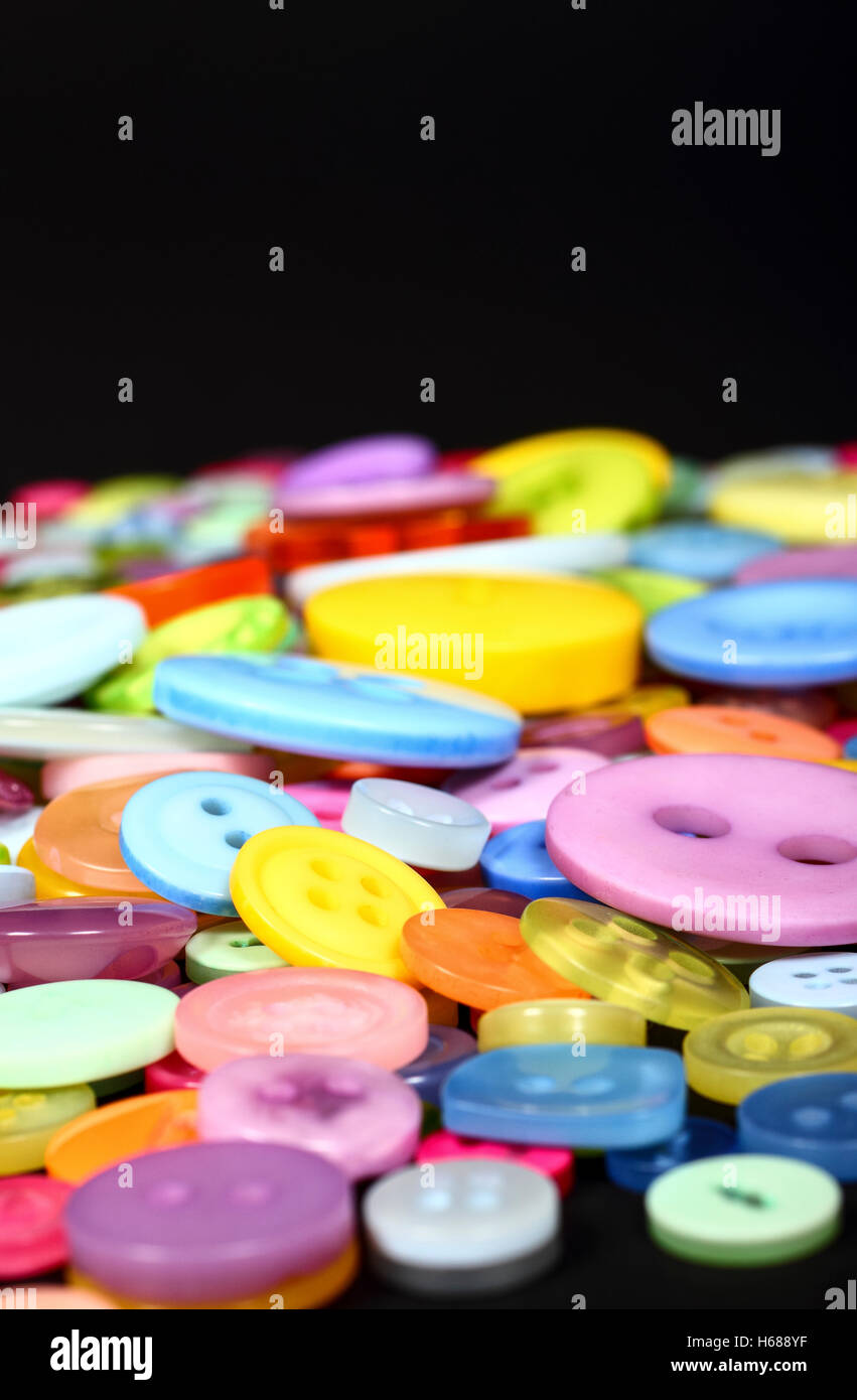 Selection of colourful plastic sewing buttons Stock Photo - Alamy