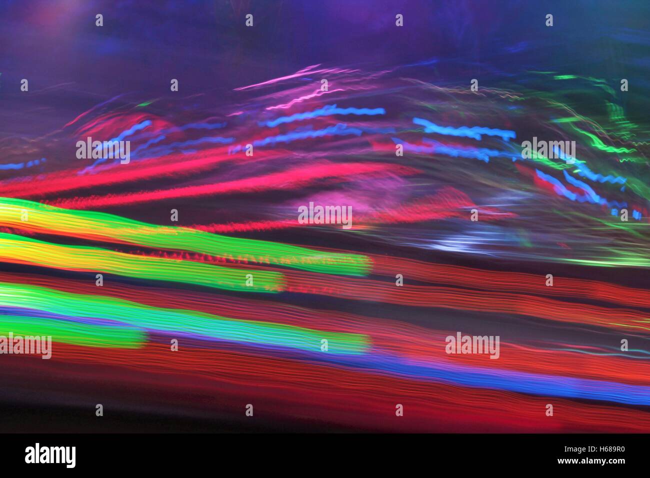 disco lights neon fairground funfair ride moving fast fair lights Night ...