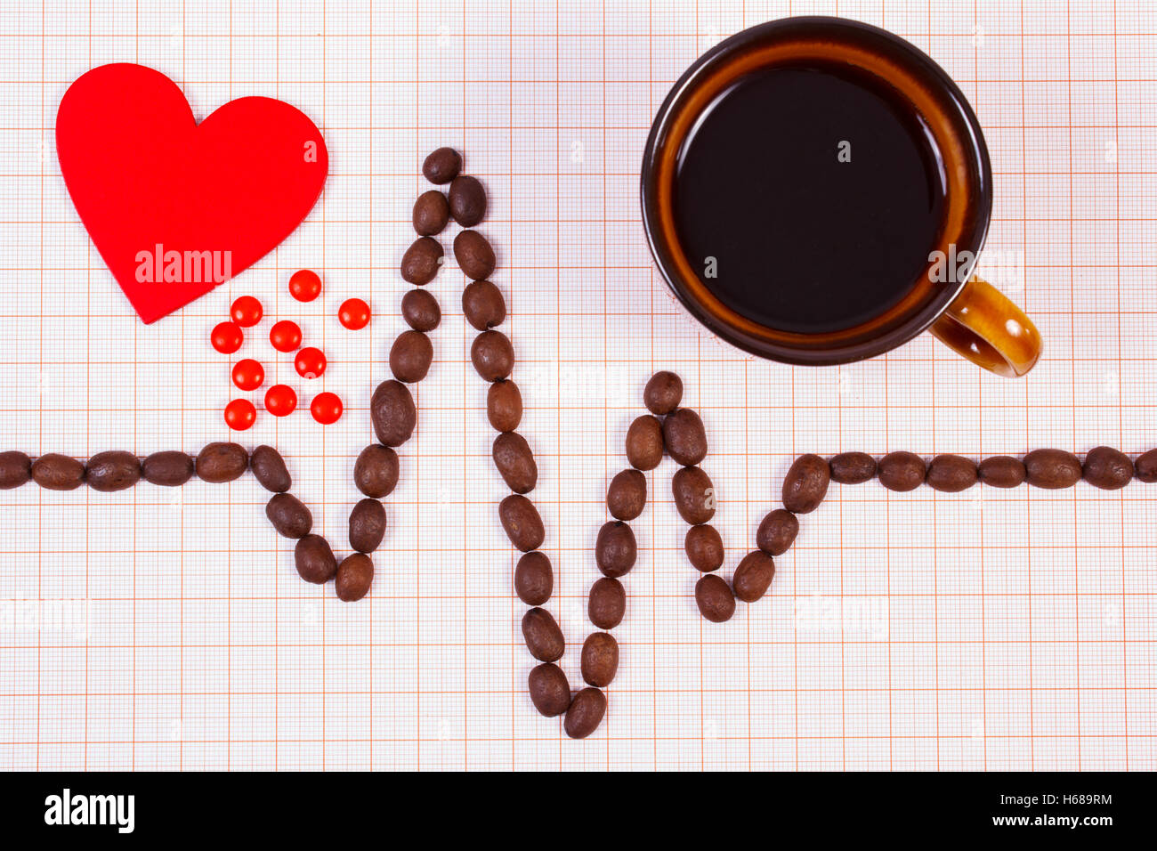 Electrocardiogram line of roasted coffee grains, cup of hot beverage ...