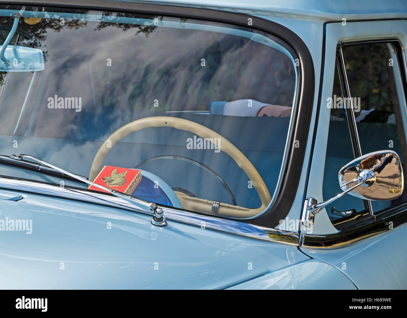 Front view of an old blue limousine in the driver's seat Stock Photo ...