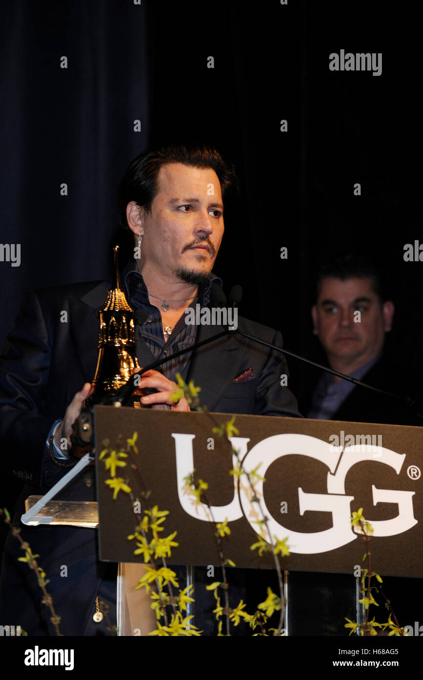 Actor Johnny Depp with his award at the Maltin Modern Master award ...