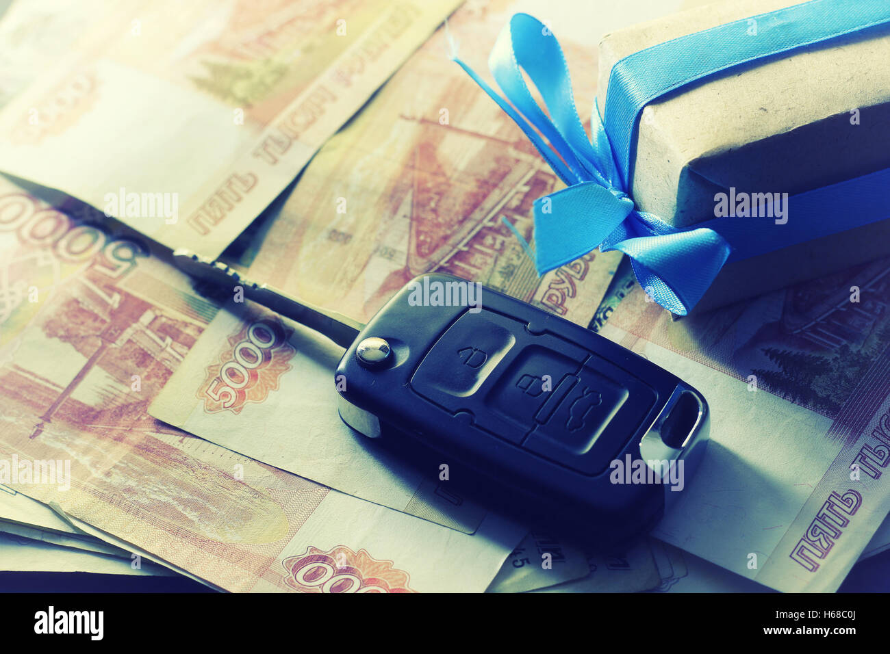 Money key gift Stock Photo - Alamy