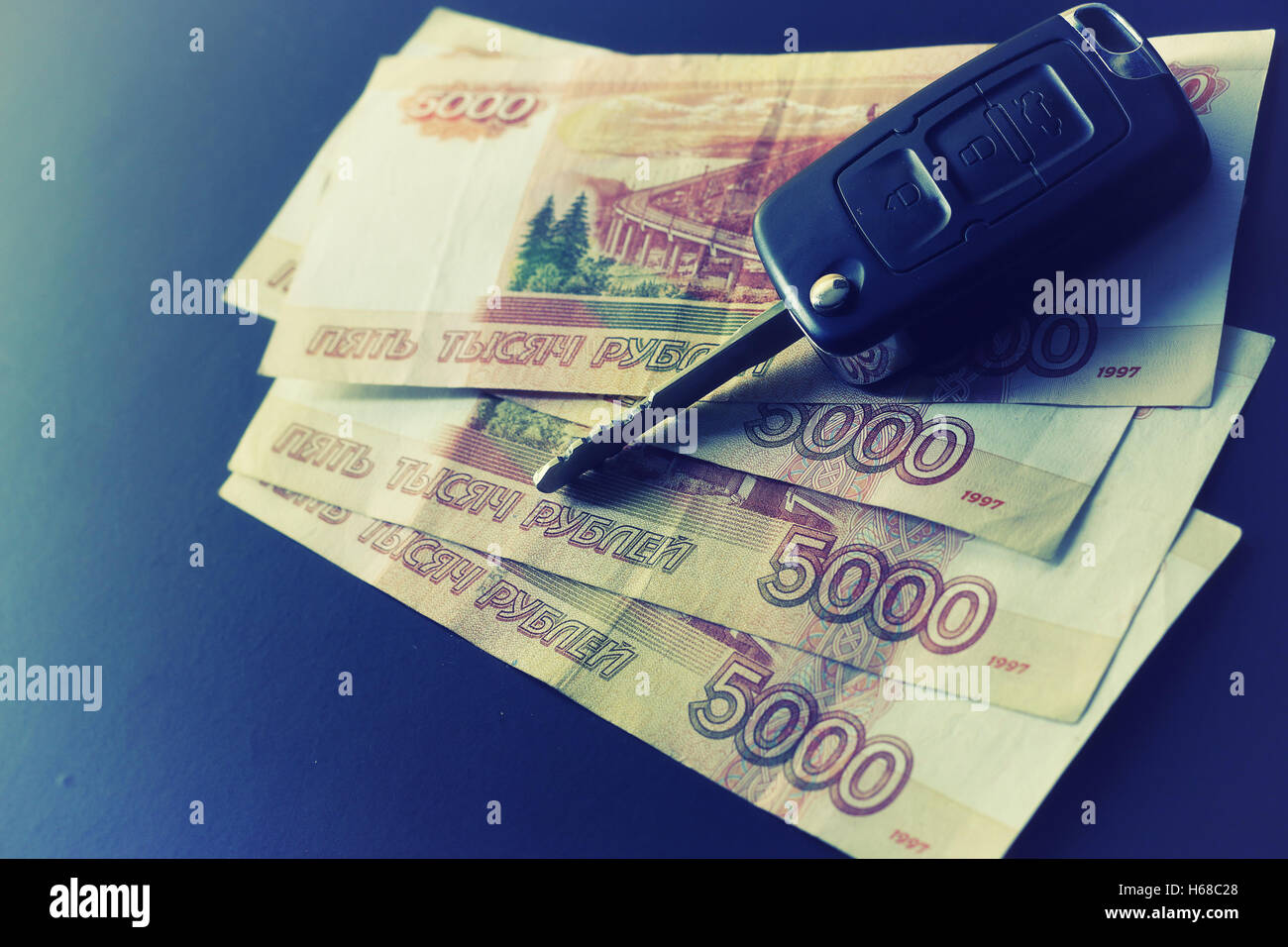 Money key gift Stock Photo - Alamy