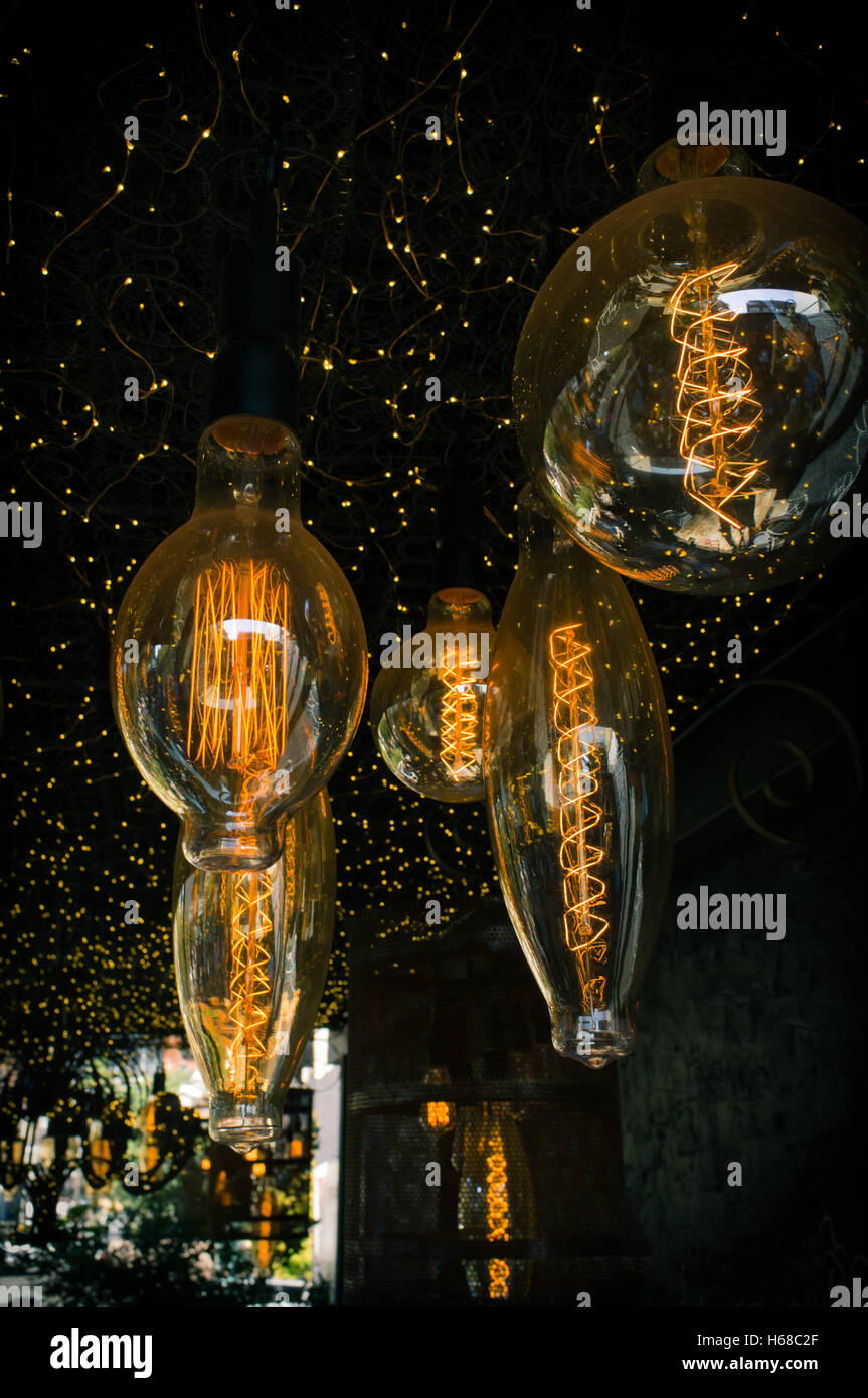 Decorative antique edison style hanging light bulbs Stock Photo - Alamy
