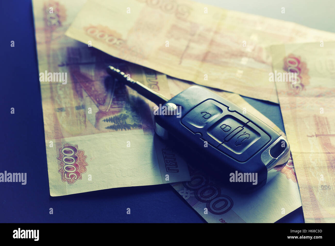 Money key gift Stock Photo - Alamy