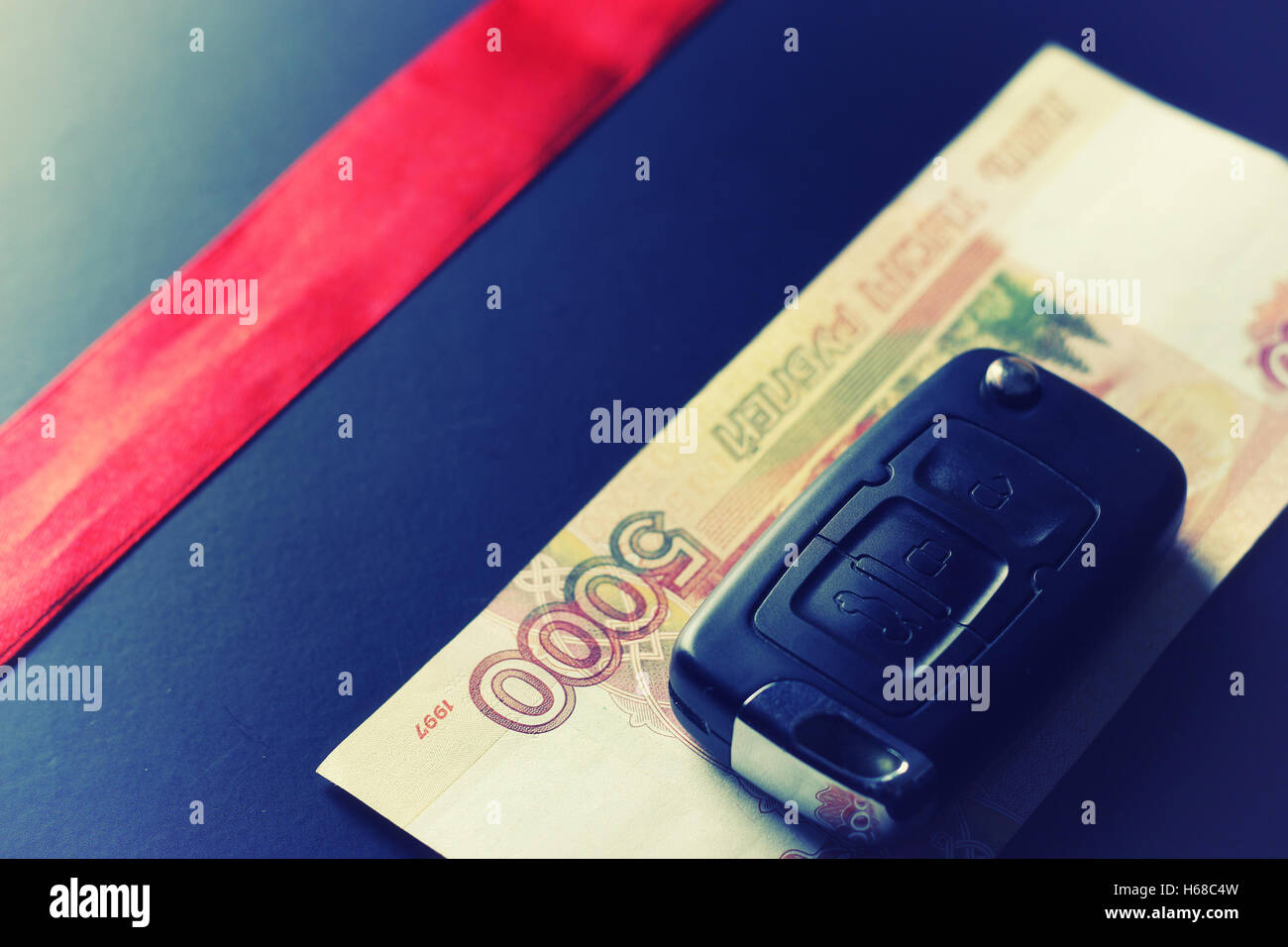 Money key gift Stock Photo - Alamy