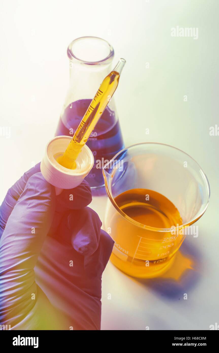 Close up glass measuring beaker for science experiment background Stock ...