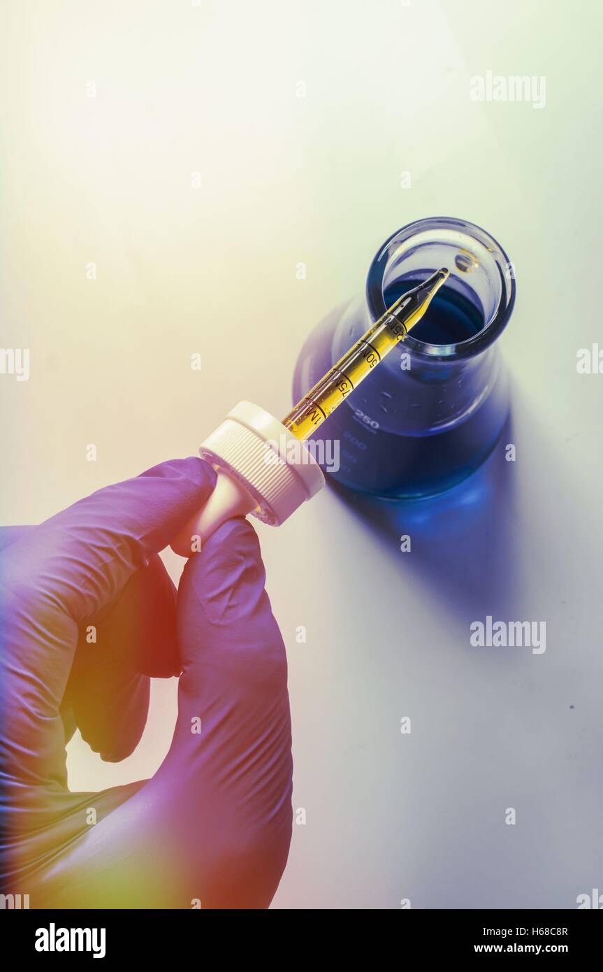 Close up glass measuring beaker for science experiment background Stock ...