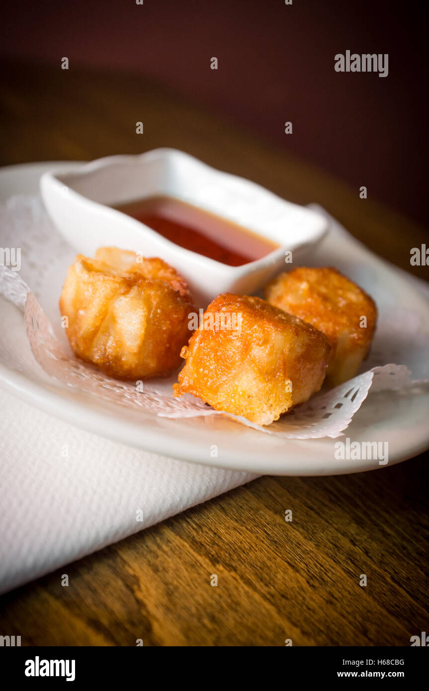 Delicious Chinese Dim Sum shumai dumplings topped with sweet sauce ...