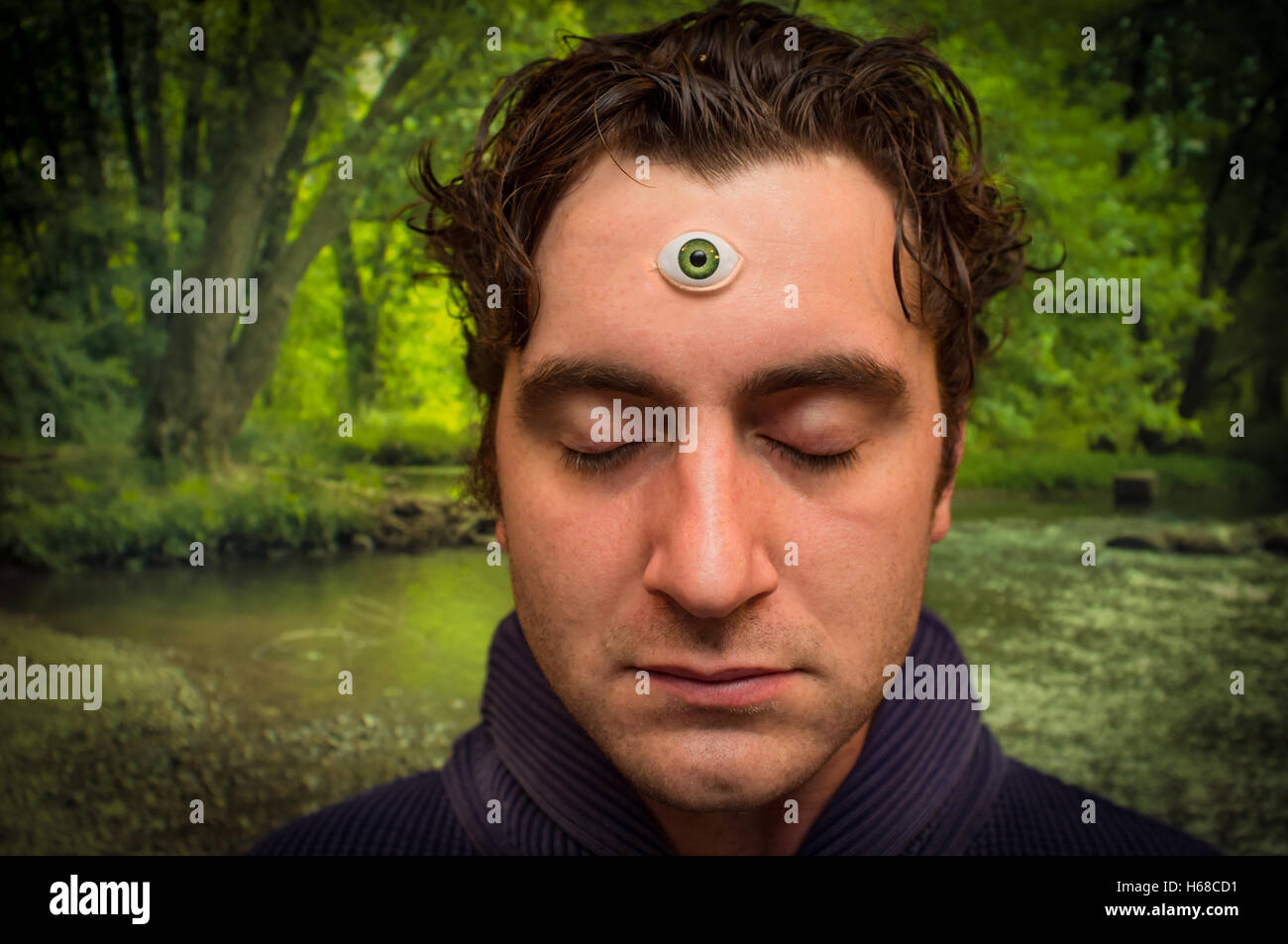 Handsome male fortune teller with magic third eye Stock Photo - Alamy